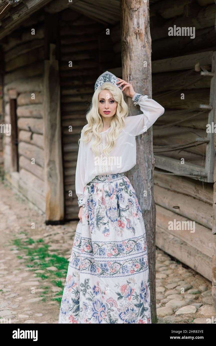 Stylish russian female in traditional national folk dress sundress and ...
