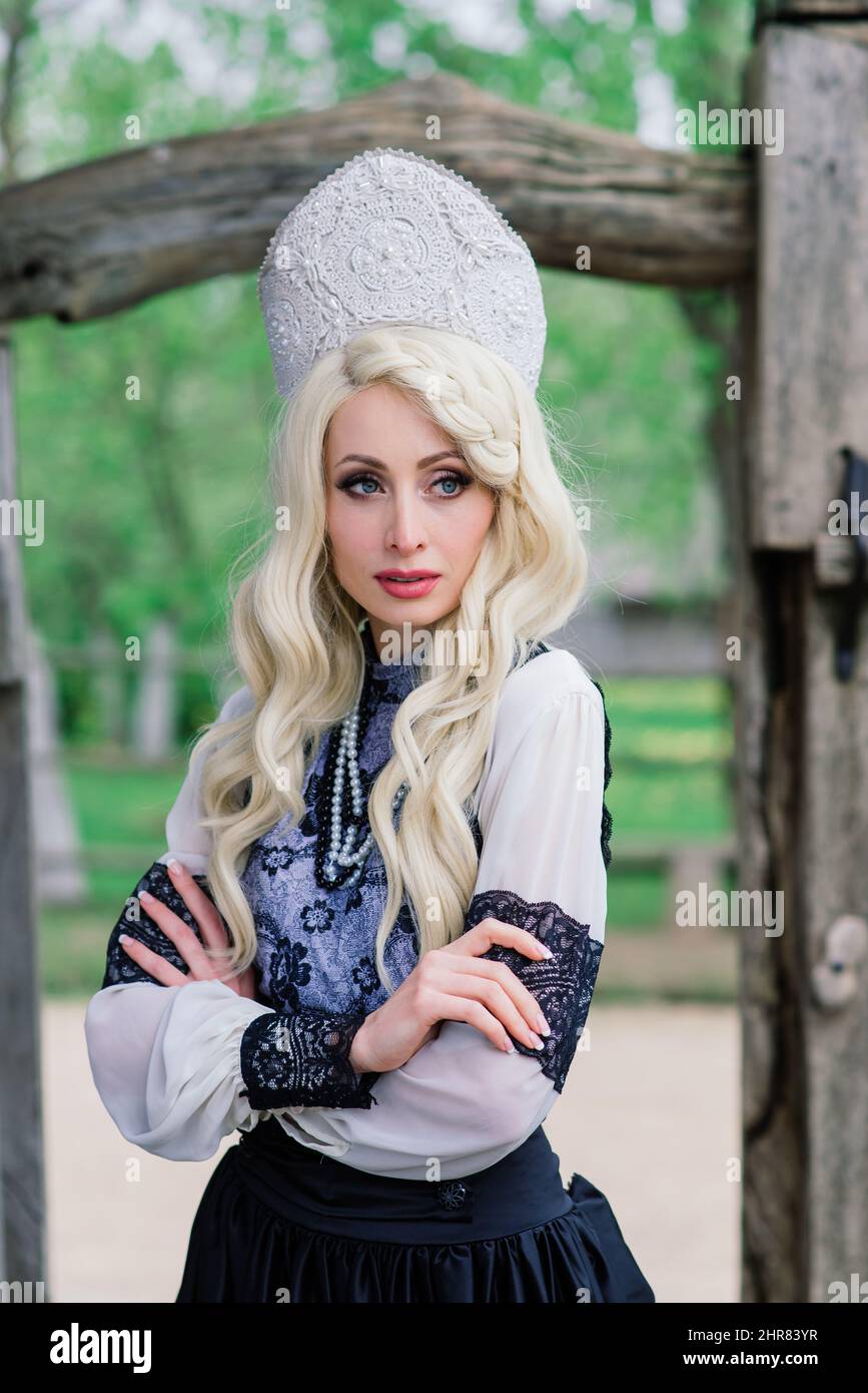 Stylish russian female in traditional national folk dress sundress and ...