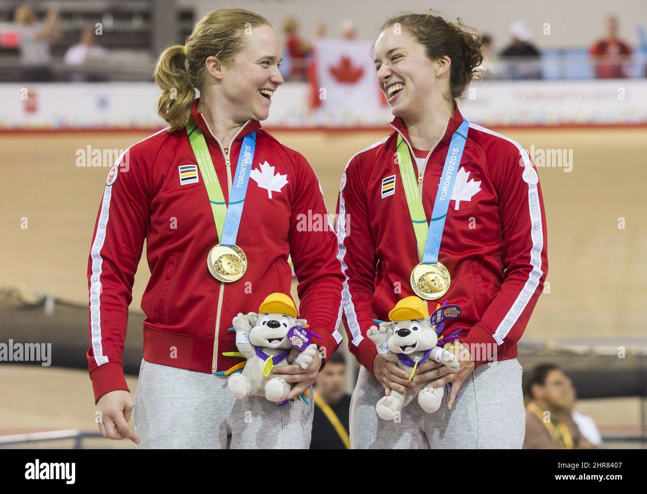 Canada's Kate O'Brien, left, and Monique Sullivan smile with their gold ...