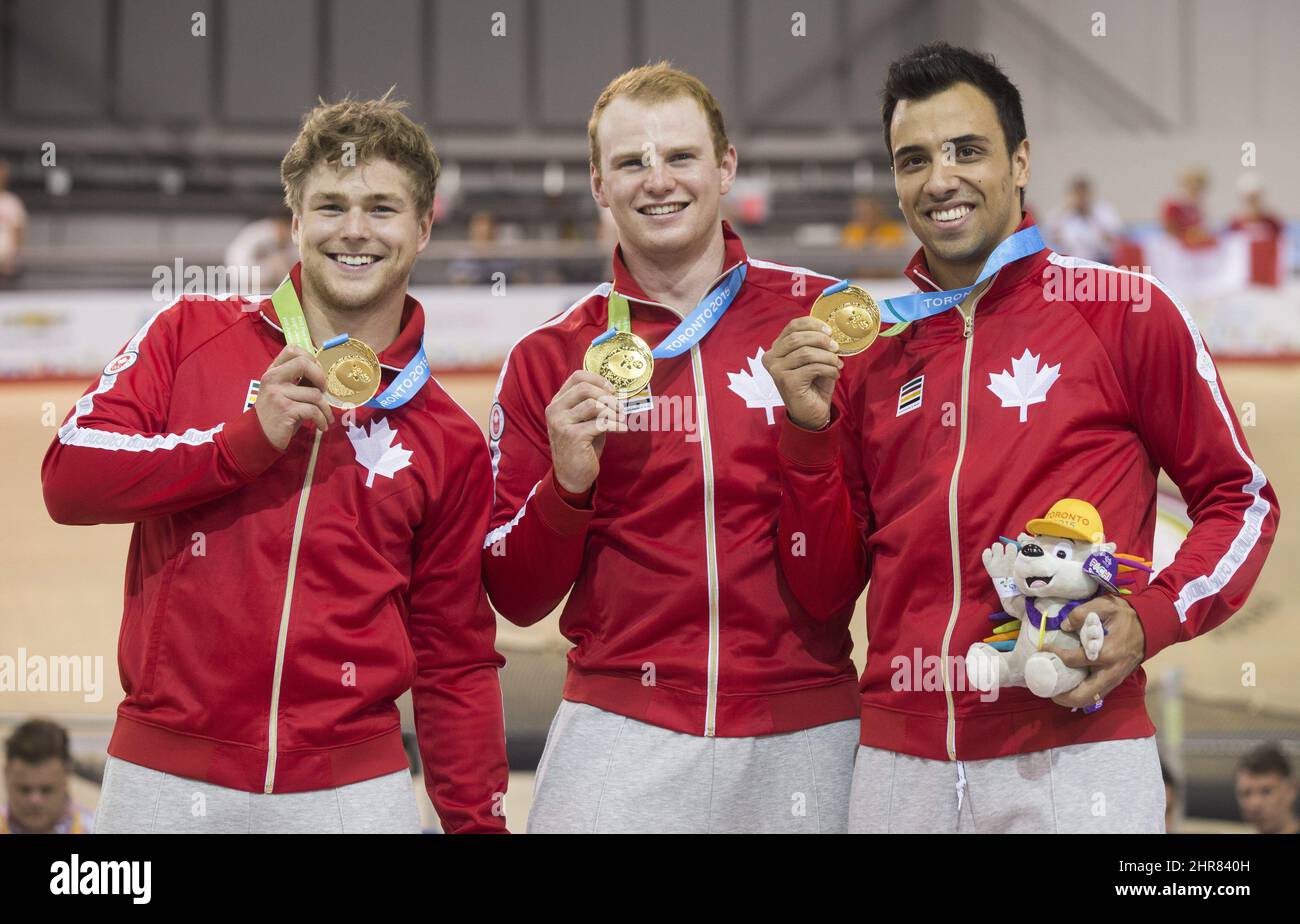 Canada's Hugo Barrette, left to right, Evan Carey, and Joseph Veloce hold their gold medals ...