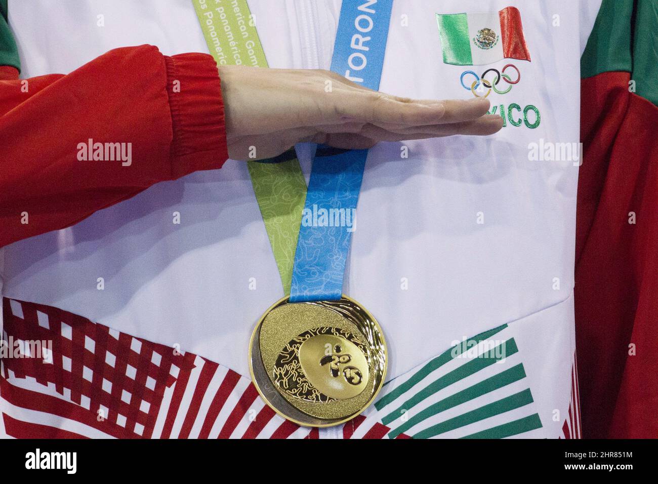 Mexico's Saul Gutierrez wears his gold medal on the podium as he ...