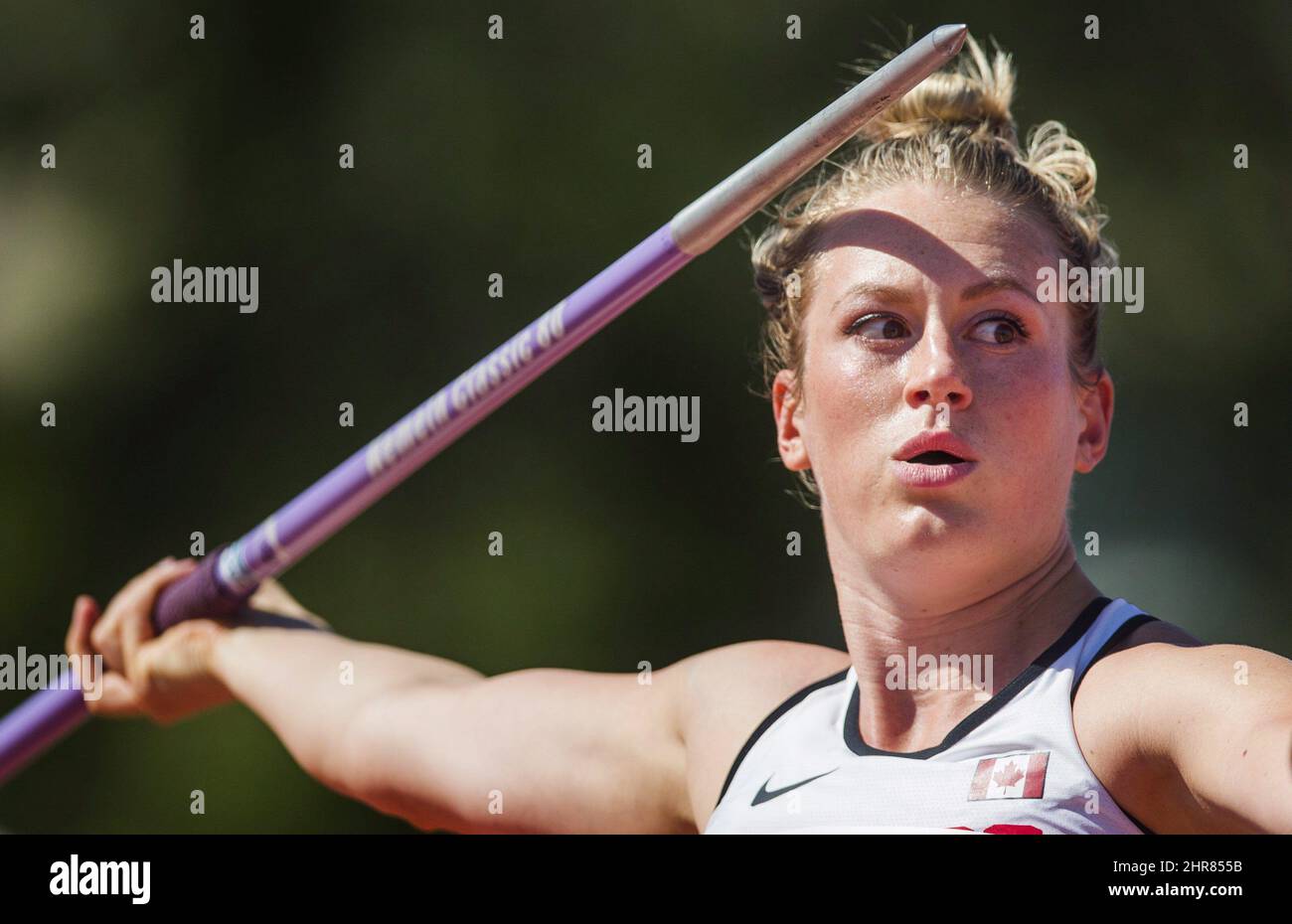 Elizabeth Gleadle of Canada competes on her way to win the gold medal ...