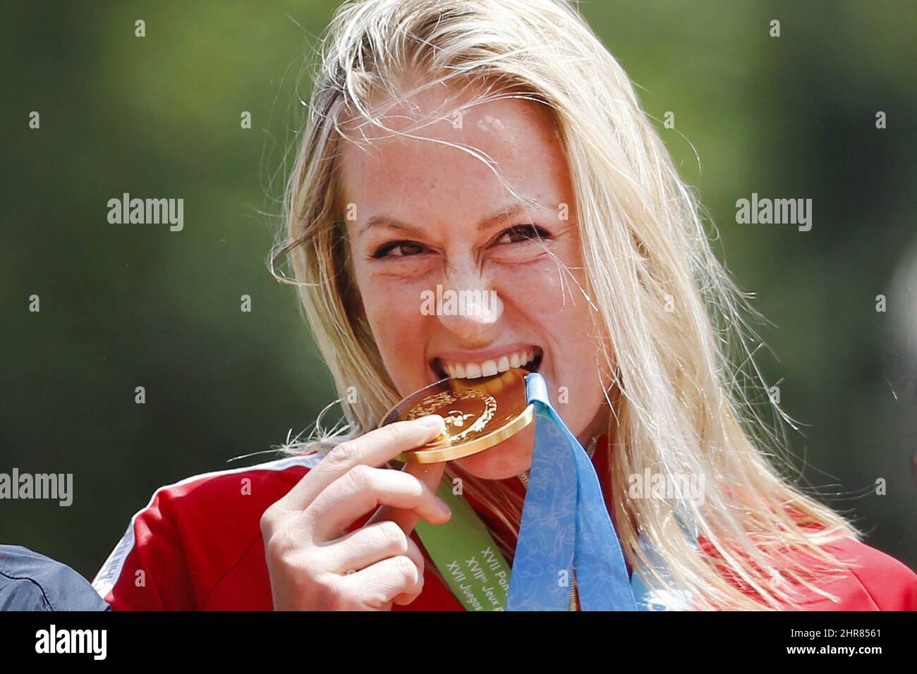 Elizabeth Gleadle of Canada celebrates with her gold medal in javelin ...