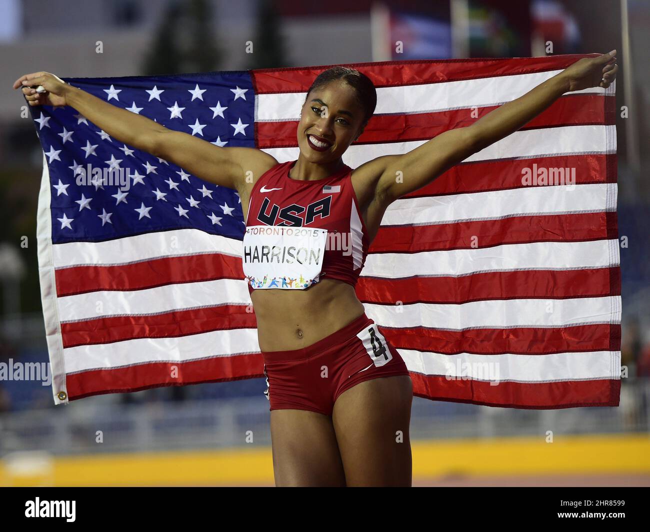 Queen Harrison, of USA, celebrates winning the women's 100m hurdles ...
