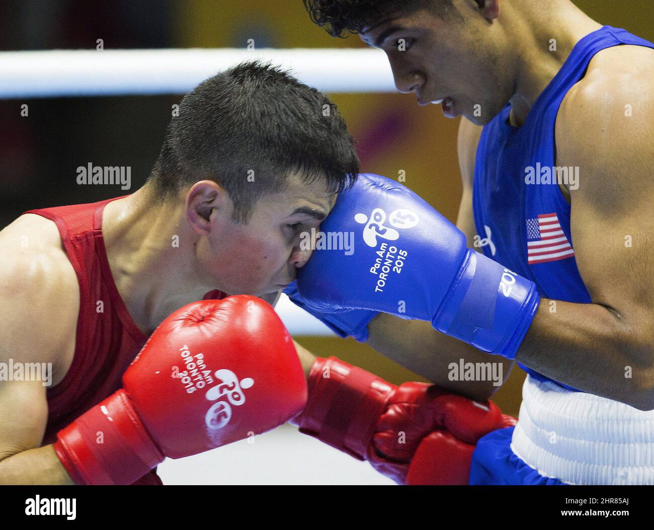 Lindolfo Delgado, of Mexico, takes a punch to the face from Carlos ...