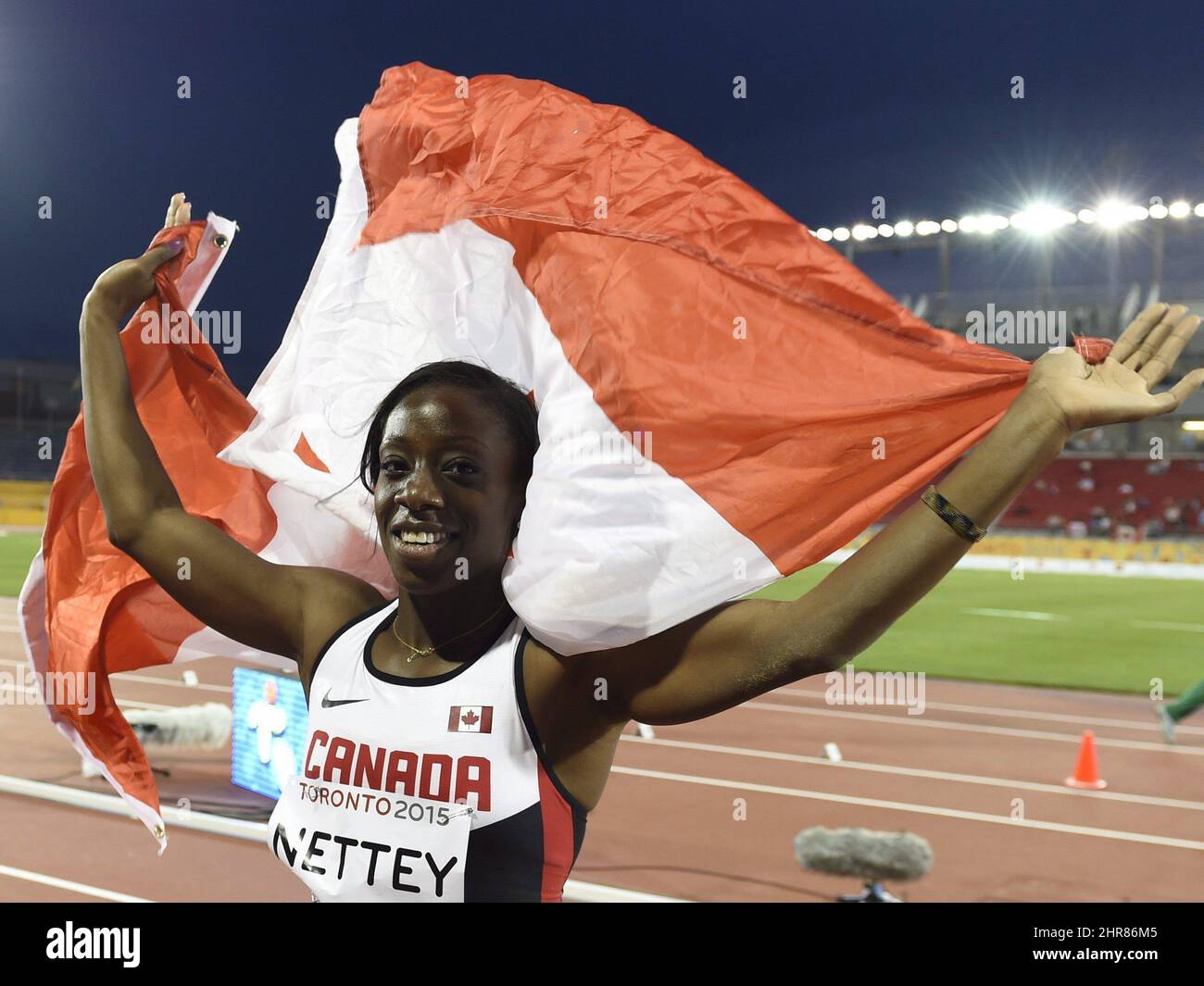 Christabel Nettey, of Canada, celebrates winning the gold medal in the ...