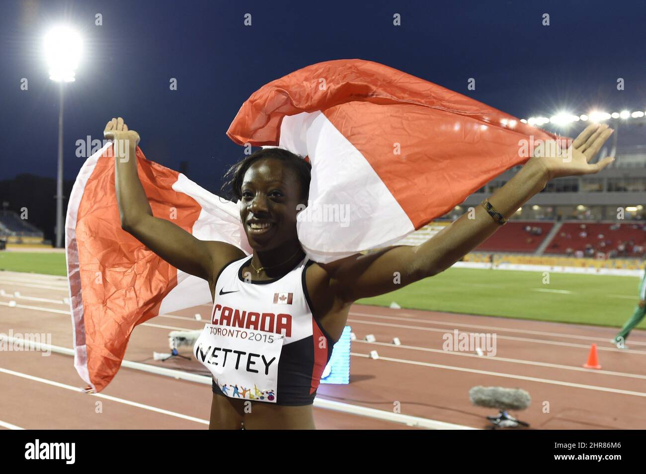 Christabel Nettey, of Canada, celebrates winning the gold medal in the ...