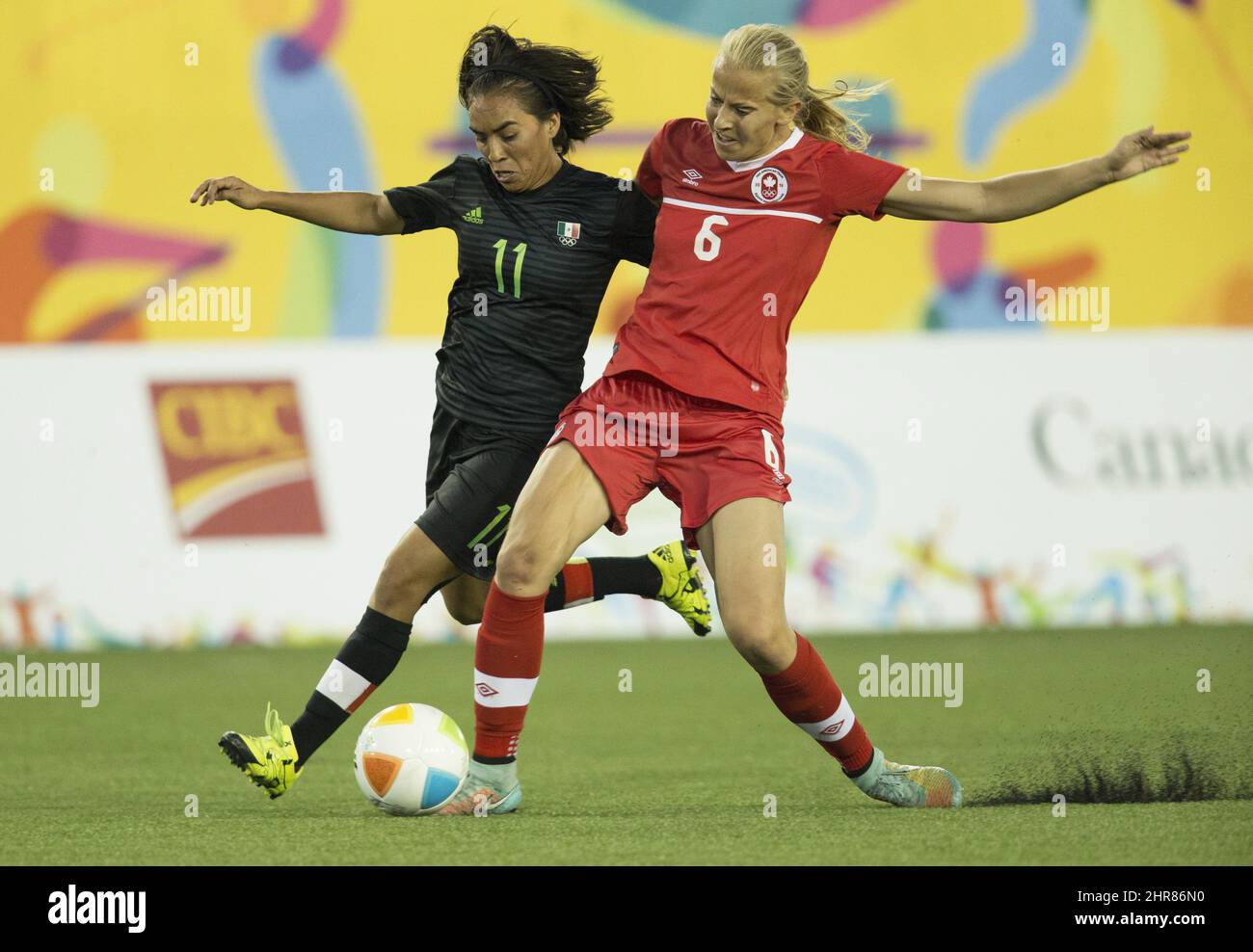 Canada's Rebecca Quinn (6) and Mexico's Monica Ocampo (11) fight for ...