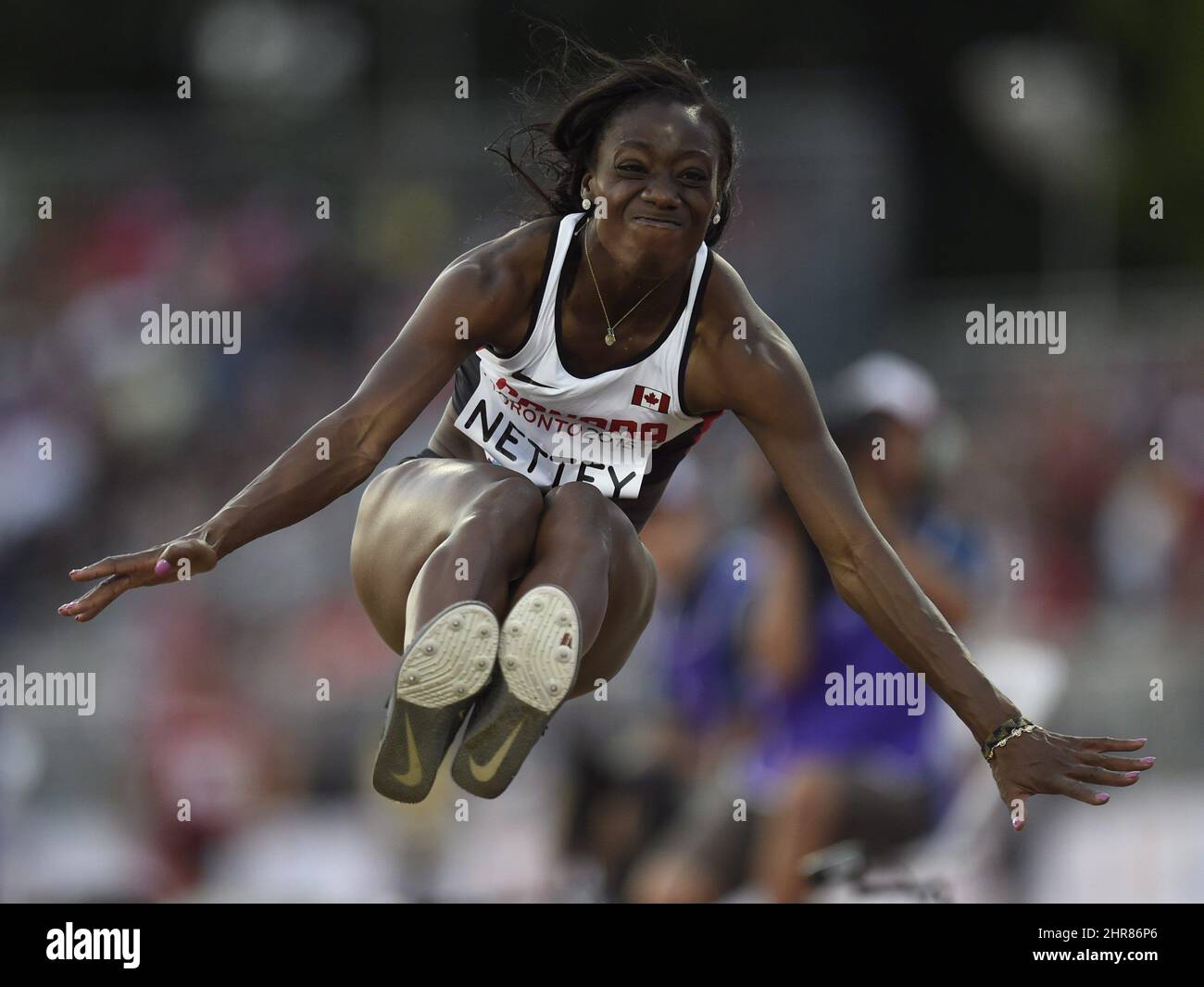 Christabel Nettey, of Canada, competes in the women's long jump final ...