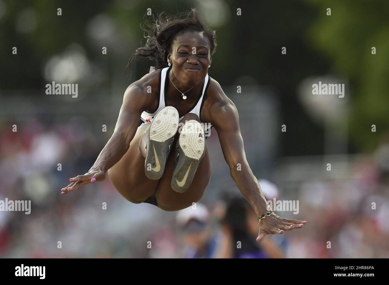 Christabel Nettey, of Canada, competes in the women's long jump final ...