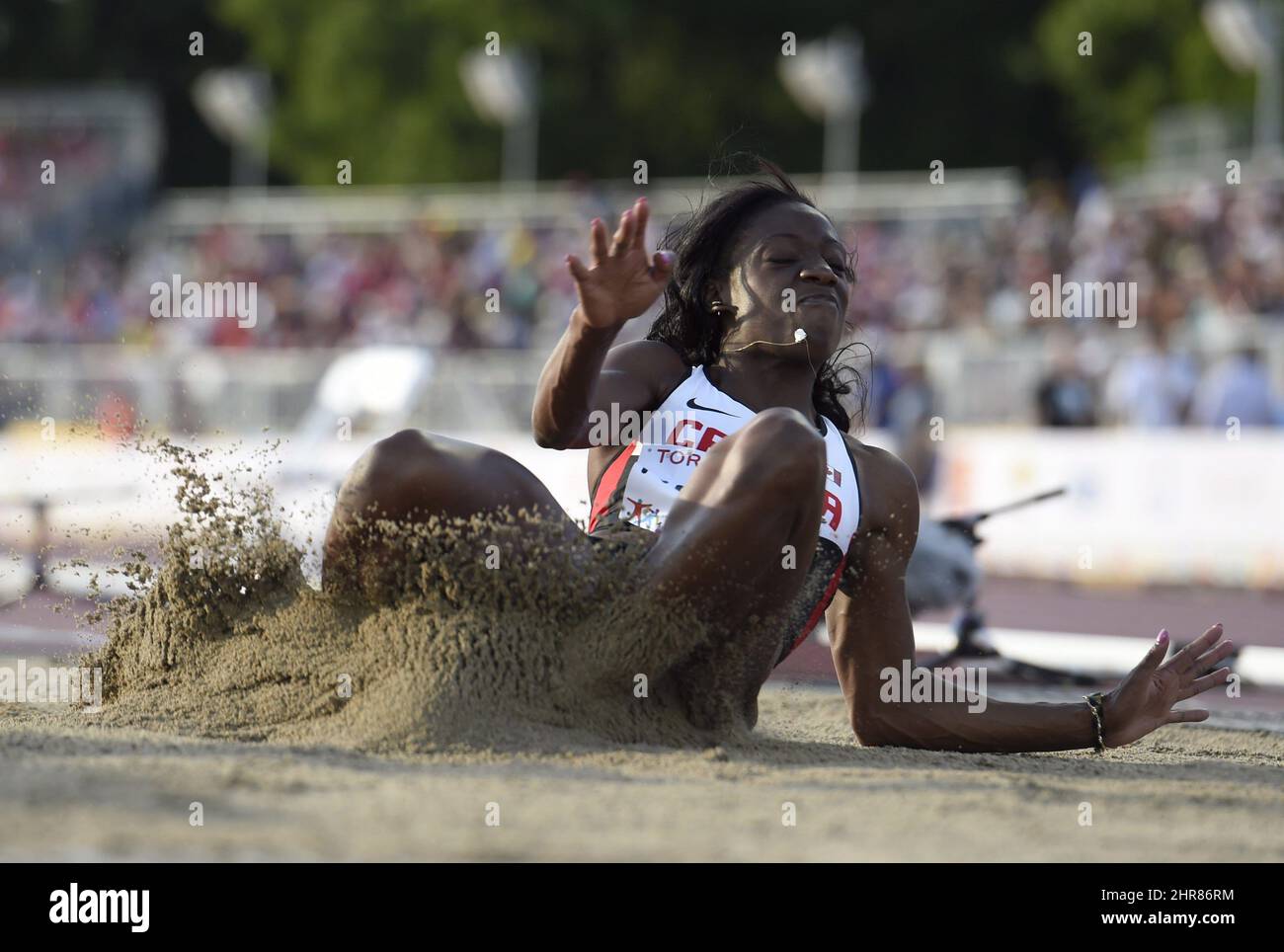 Christabel Nettey, of Canada, competes in the women's long jump final ...