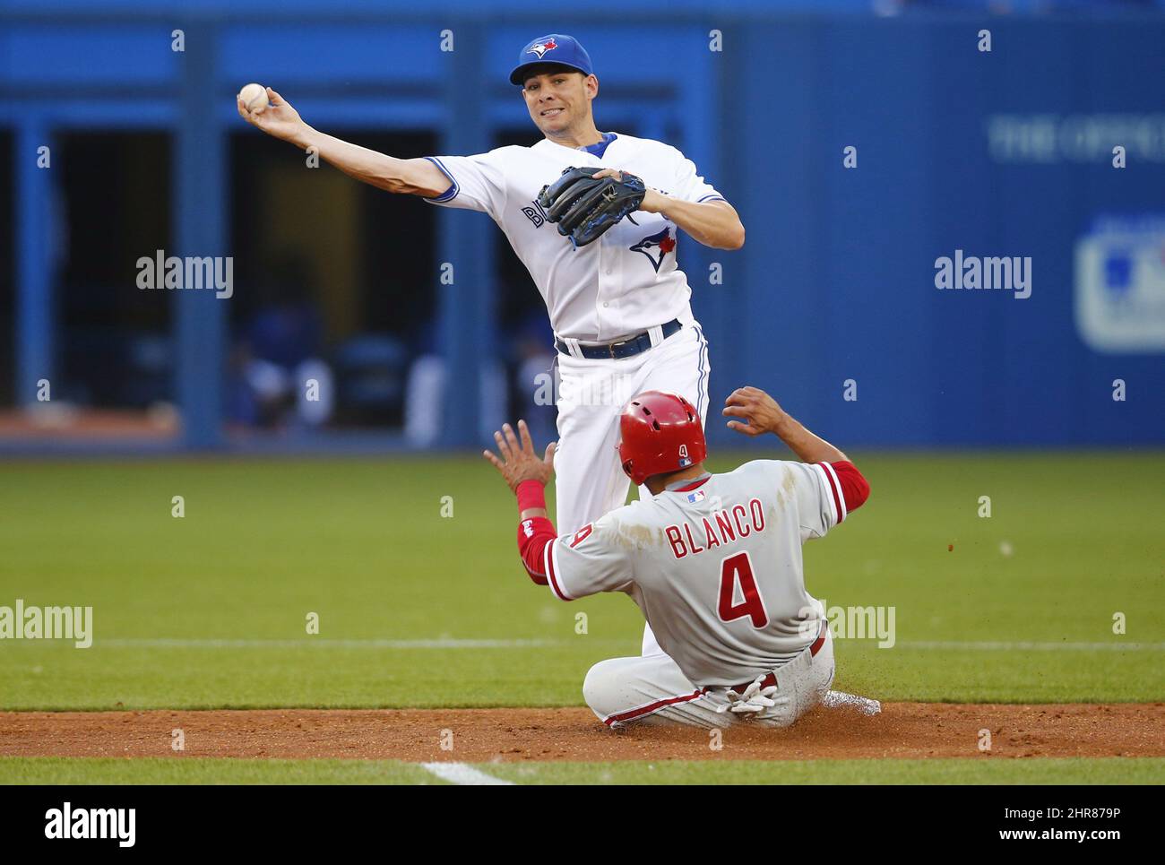 Toronto Blue Jays' Danny Valencia turns a double pay over Philadelphia ...