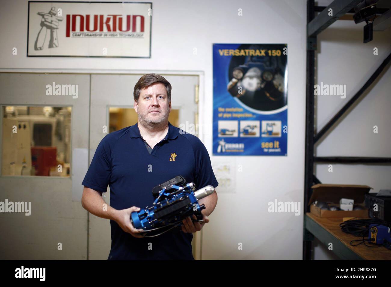 Colin Dobell, President and CEO of Inuktun, a maker of modular mobile ...