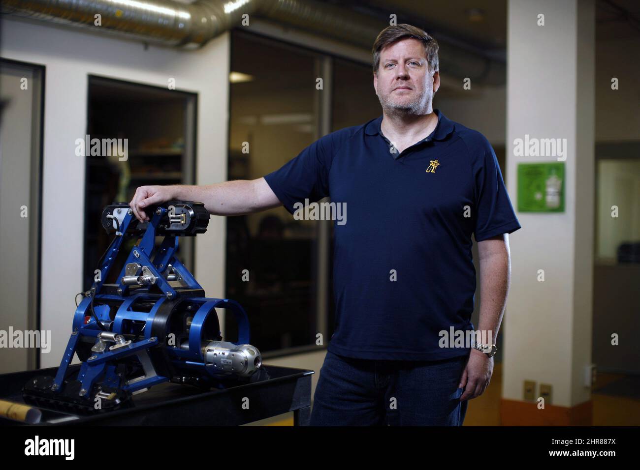 Colin Dobell, President and CEO of Inuktun, a maker of modular mobile ...