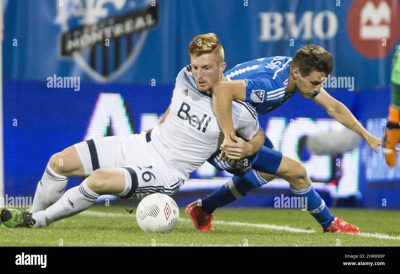 Montreal Impact's Maxim Tissot, right challenges Vancouver Whitecaps ...