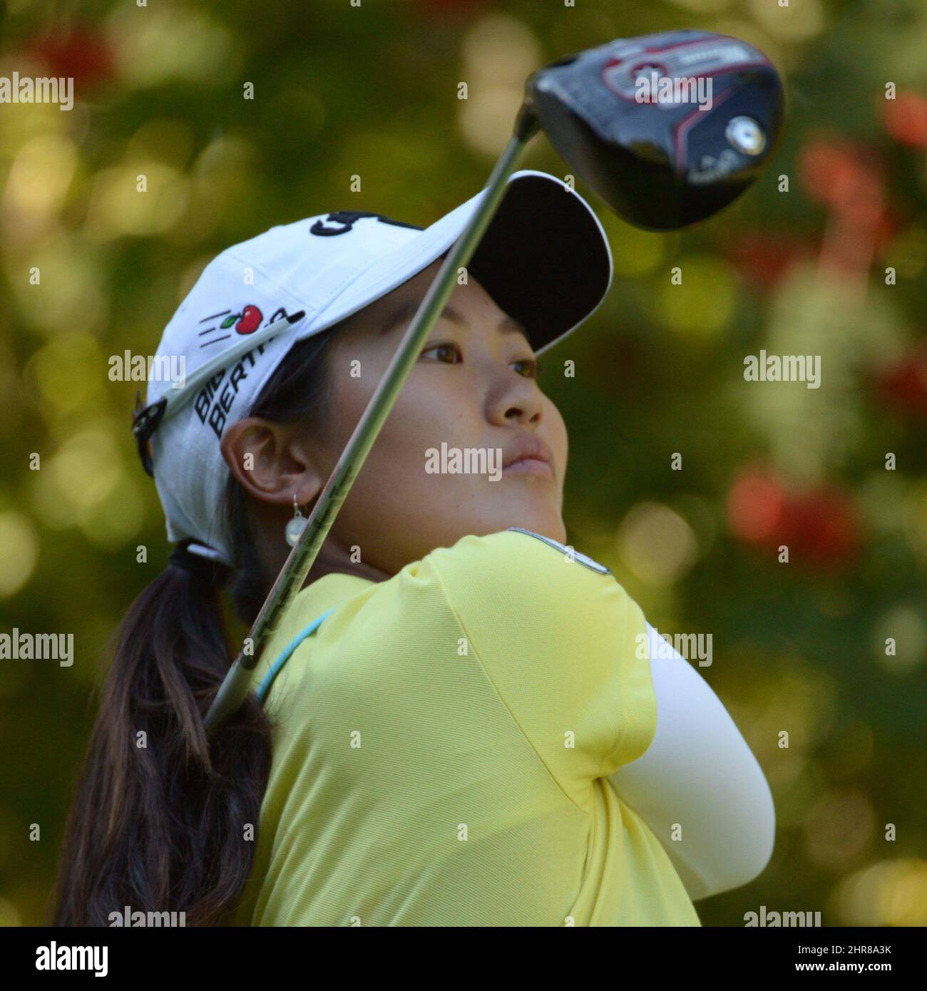 Xi Yu Lin, of China, watches her tee shot on the eighth hole at the ...