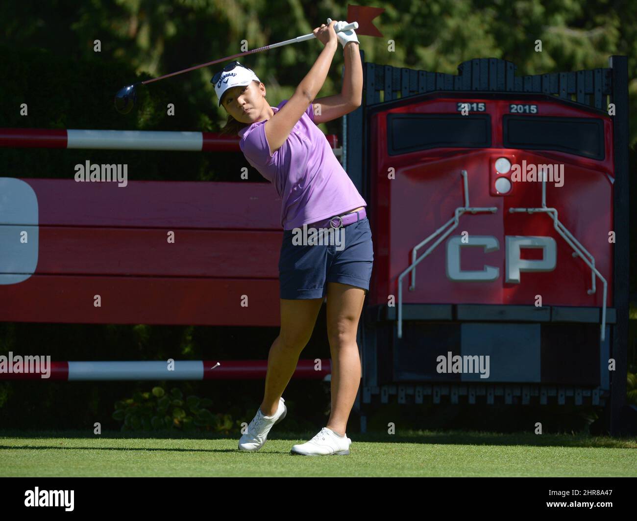 Lydia Ko, of New Zealand, watches her tee shot on the first hole at the ...