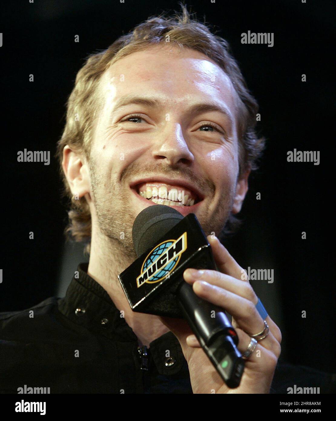 Lead-singer of Coldplay Chris Martin smiles during a MuchMusic ...