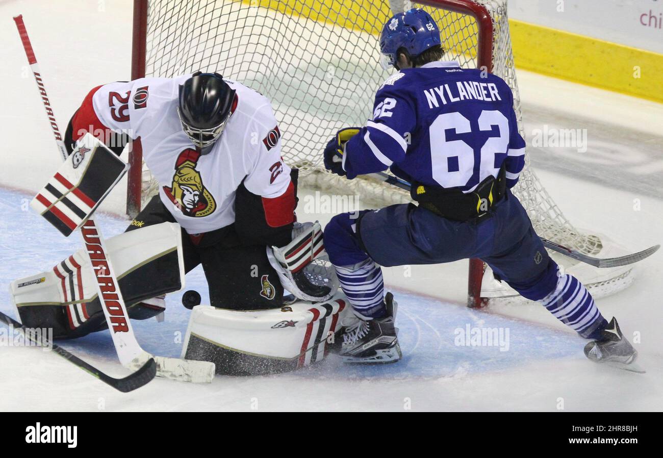 Toronto Maple Leafs' William Nylander watches his shot go through the ...