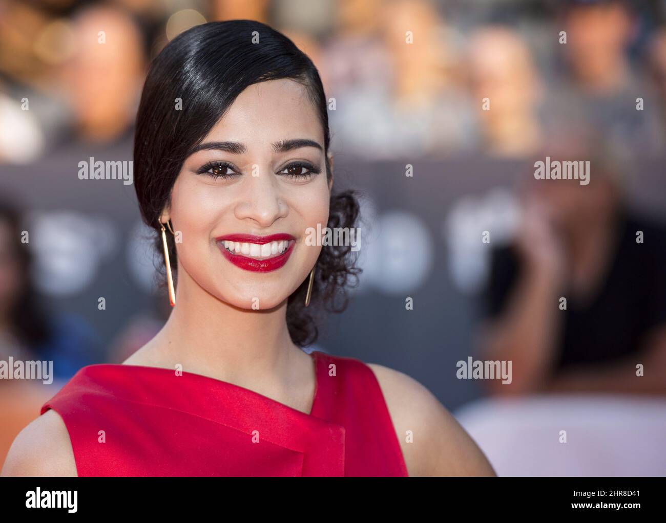 Devika Bhise smiles as she poses for photos on the red carpet at the ...
