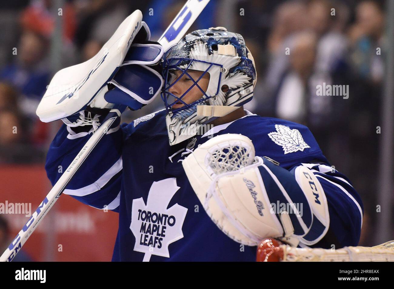 Toronto Maple Leafs goalie Jonathan Bernier adjusts his mask after ...