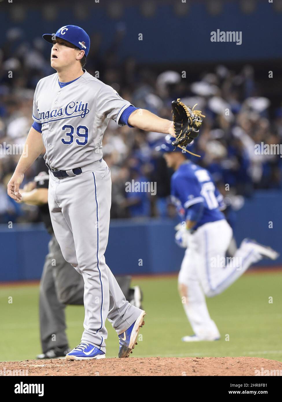Toronto Blue Jays Ryan Goins rounds the bases after hitting a solo home ...