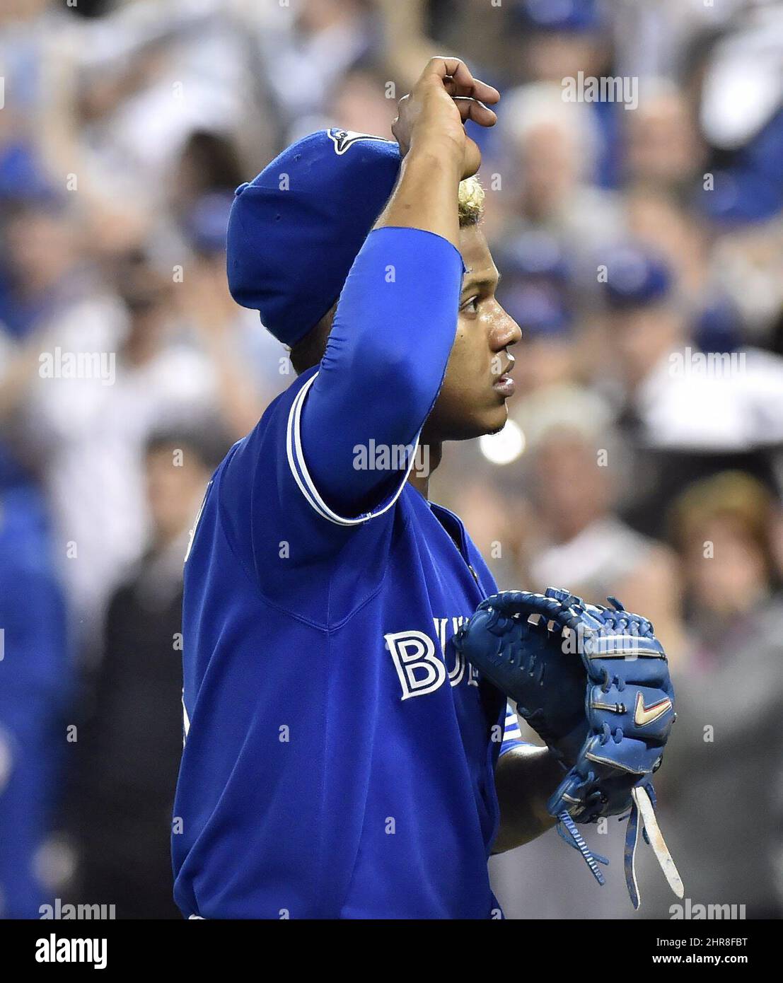 Toronto Blue Jays' pitcher Marcus Stroman tips his cap to the crowd ...