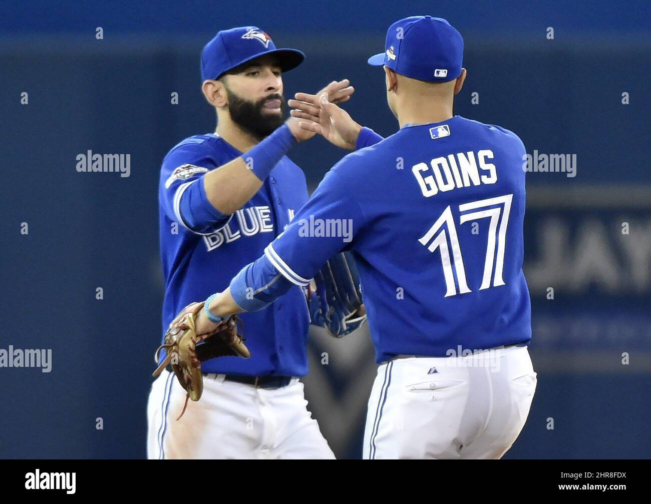 Toronto Blue Jays' Jose Bautista and Ryan Goins celebrate their 11-8 ...