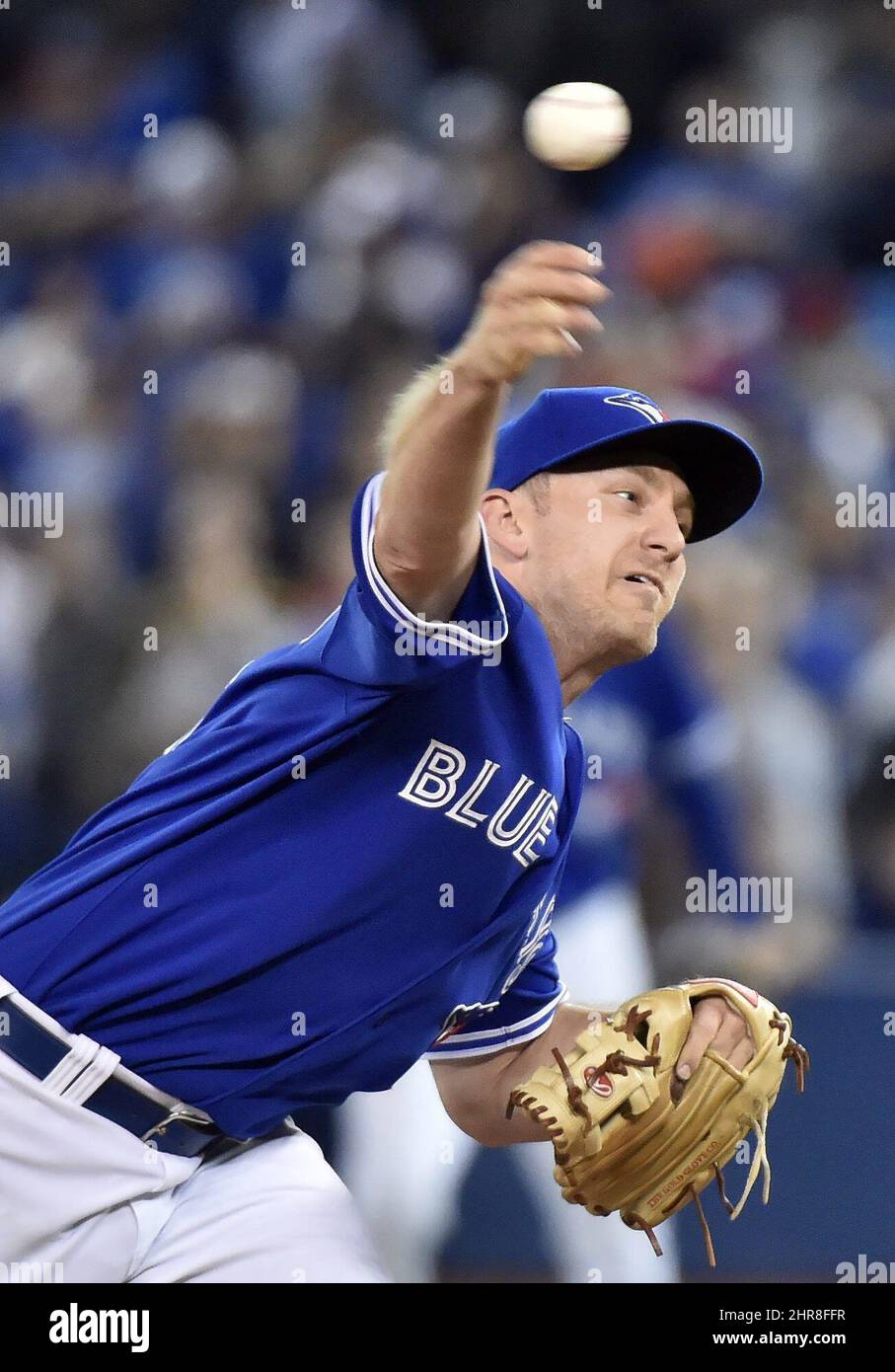 Toronto Blue Jays' infielder Cliff Pennington pitches to the Kansas ...