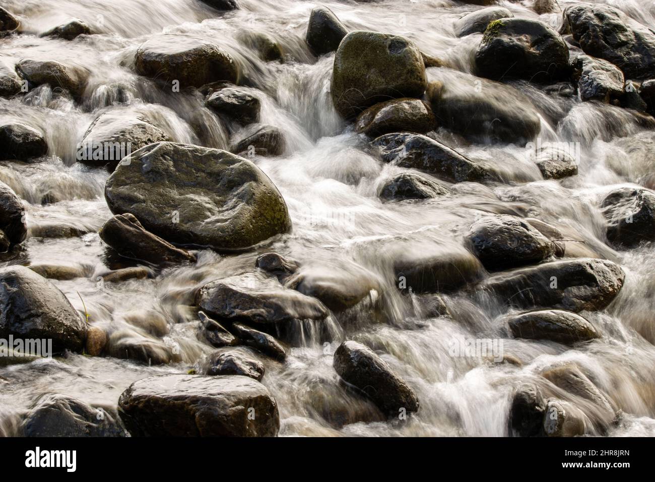 Water running over pebbles or rocks hi-res stock photography and images ...