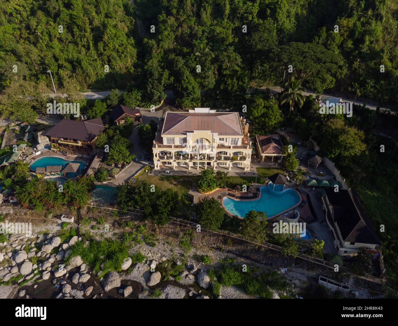 Aerial view or a hotel spa pool retreat getaway in the forest near ...