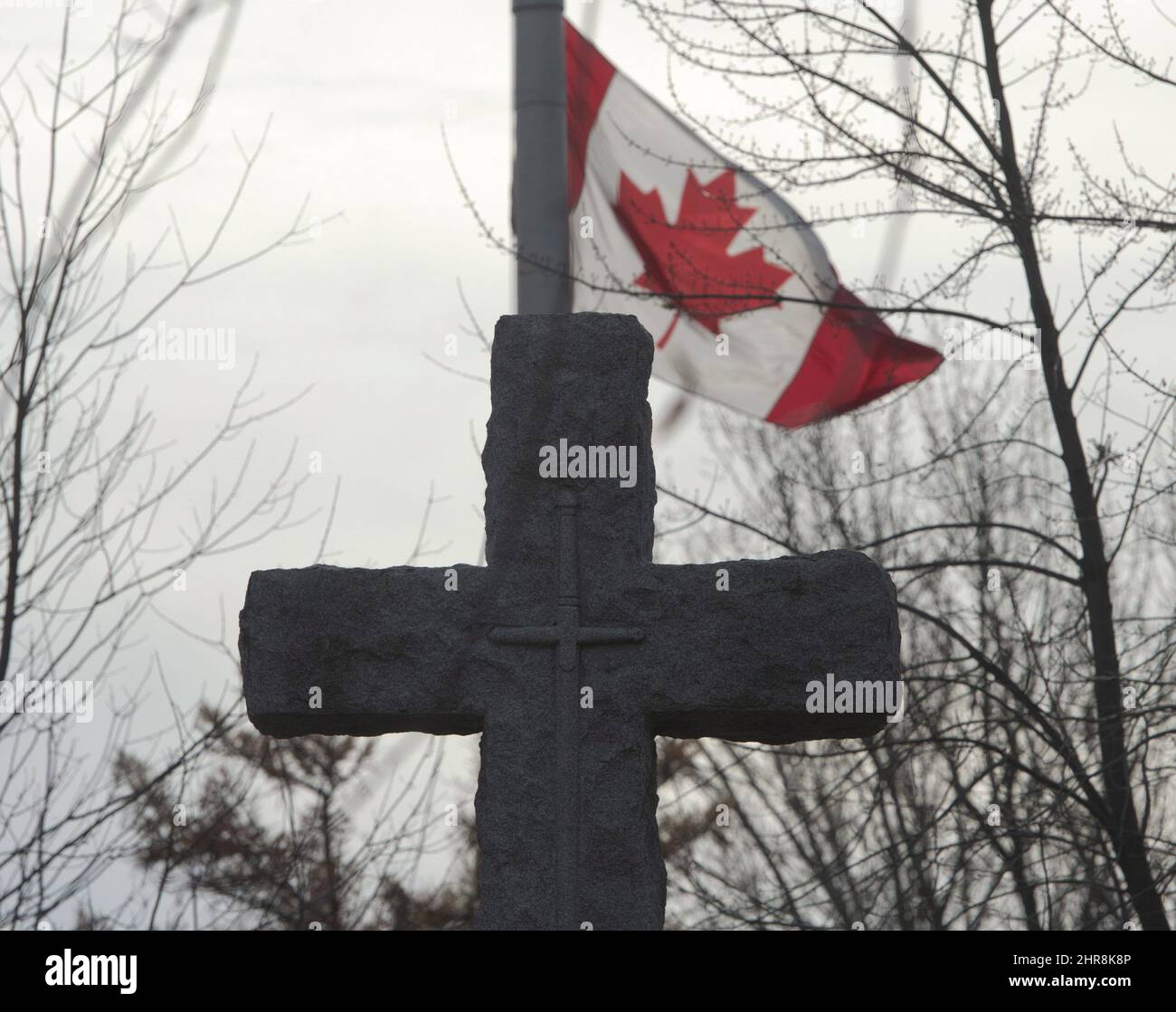 The Canadian flag flies at half staff over the cenotaph during ...