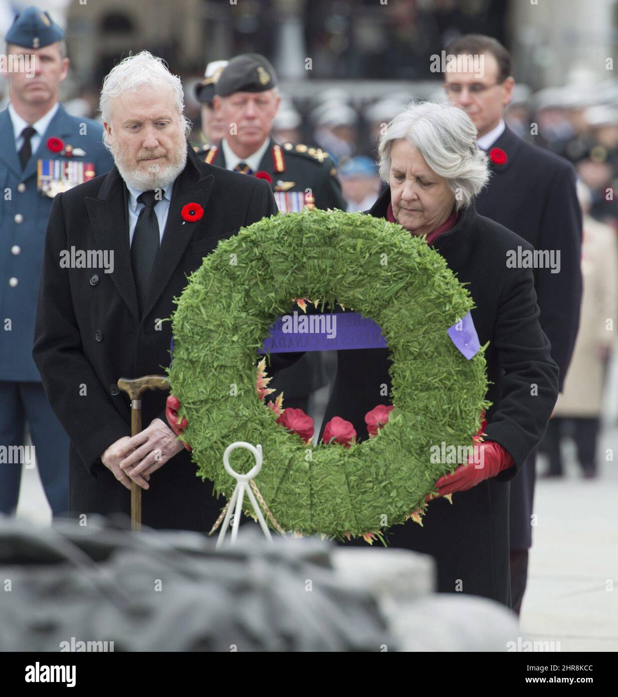 Royal Canadian Legion's Silver Cross mother Sheila Anderson lays a ...