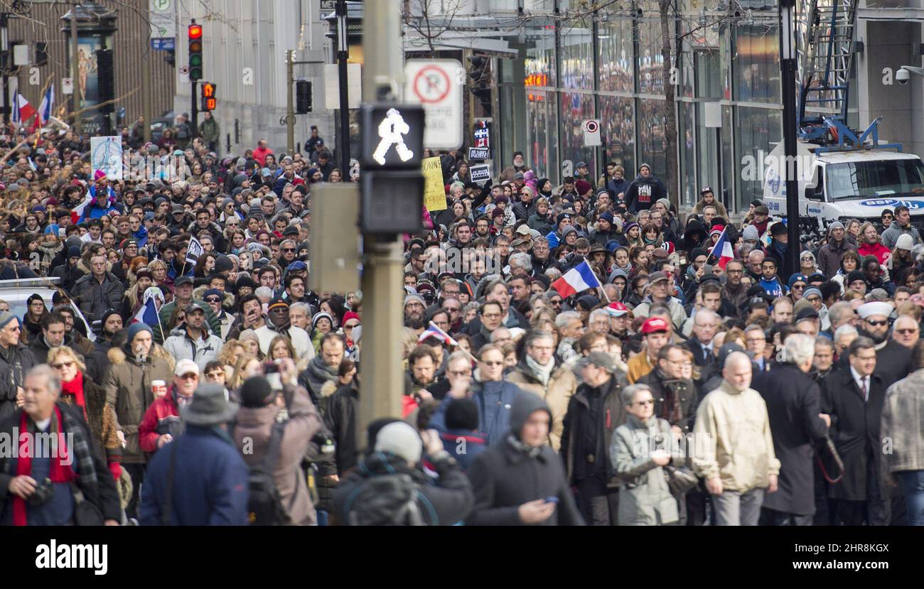 People participate in a march of solidarity in Montreal, on Sunday, Nov ...