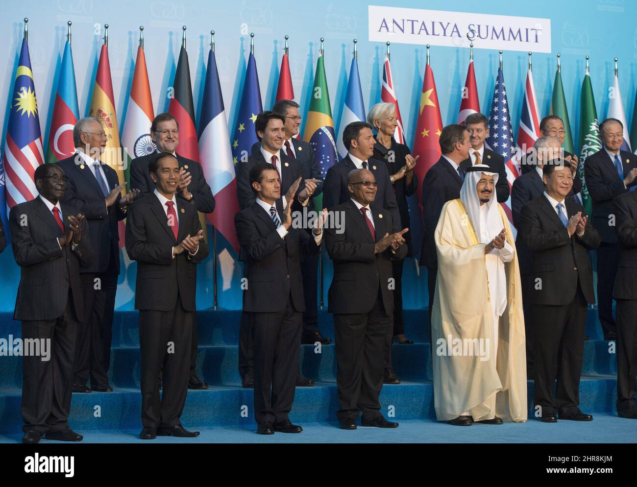 Prime Minister Justin Trudeau, second row third from left, takes part ...