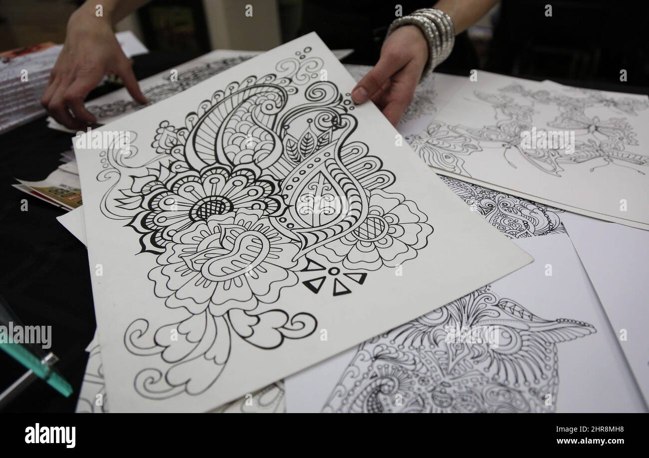 Crystal Salamon, an illustrator and adult colouring book designer, show ...