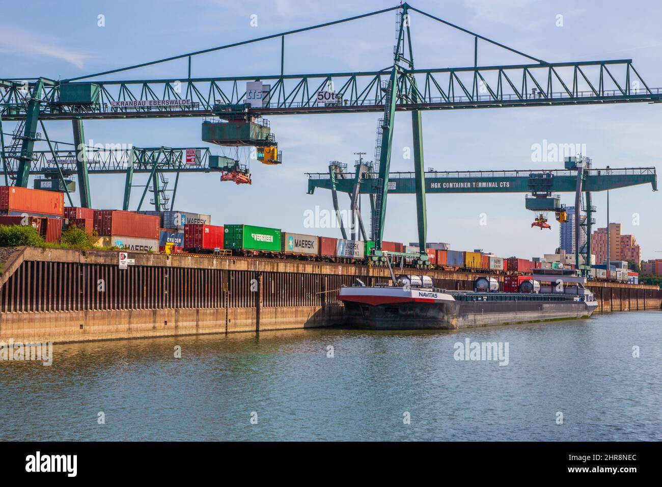 Cranes,containers and cargo around the Rhine river in the industrial ...