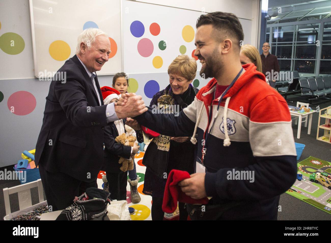 Canada's Governor General David Johnston (left) and his wife Sharon Johnston (centre) welcomes a ...