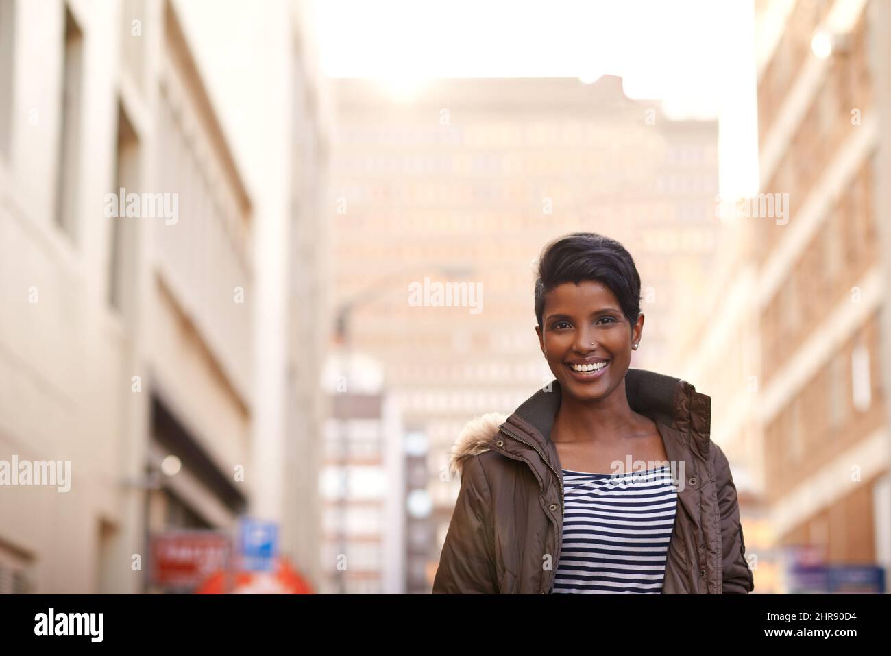 Beautiful woman walking city streets hi-res stock photography and ...