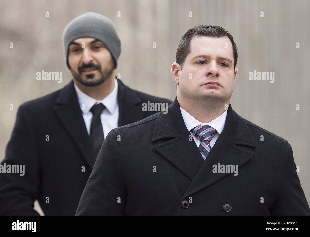 Toronto police Const. James Forcillo, right, arrives at court in ...