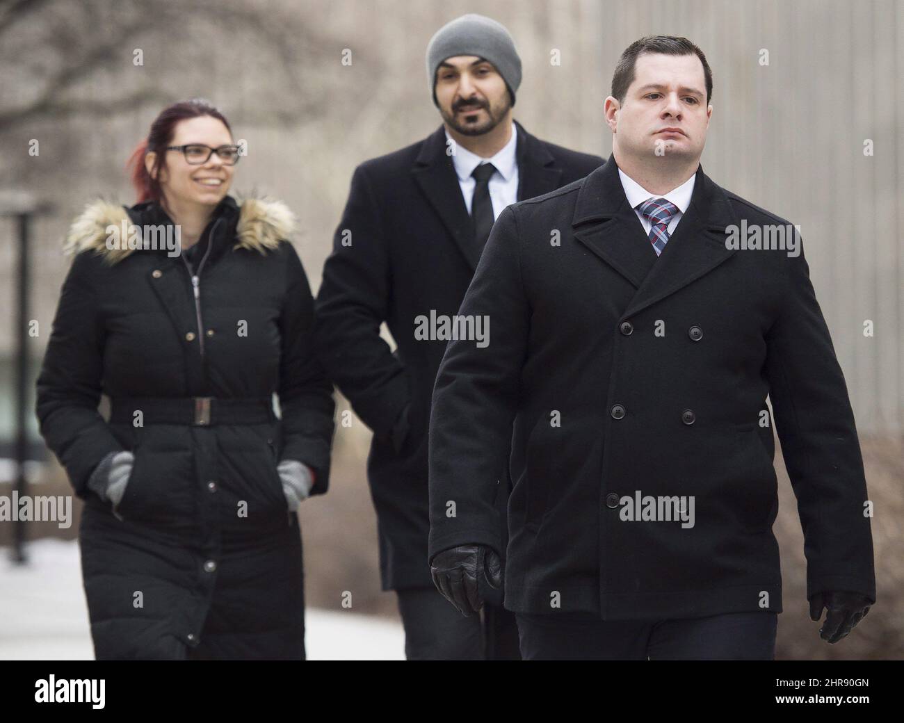 Toronto police Const. James Forcillo, right, arrives at court in ...