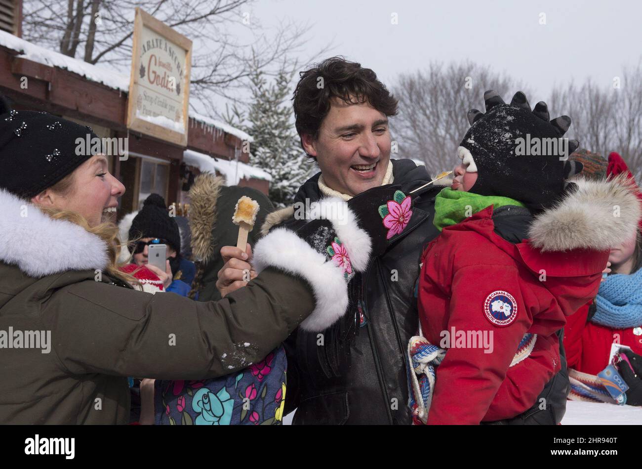 Prime Minister Justin Trudeau, centre, holds his son Hadrian, right, as ...