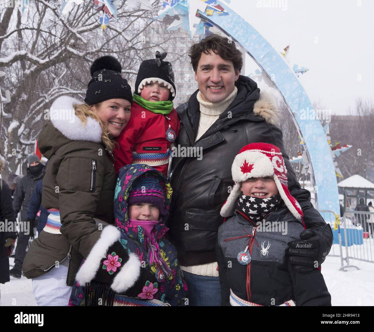Prime Minister Justin Trudeau, top right, holds his son Hadrian, centre ...