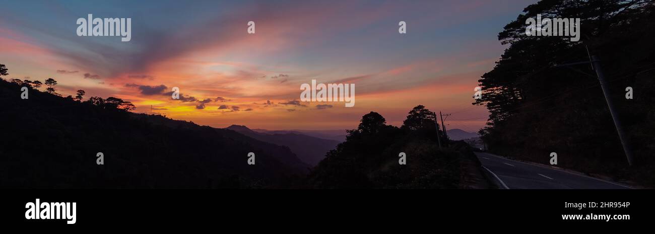 Panoramic shot of empty highway road on the hillside with breathtaking ...