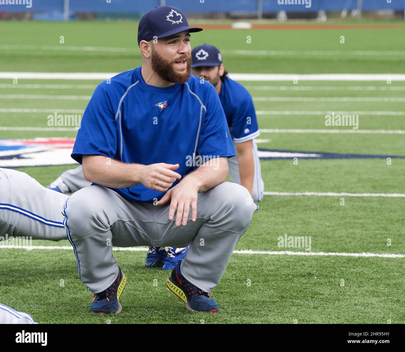 Toronto Blue Jays catcher Russell Williams tells a story to teammates ...
