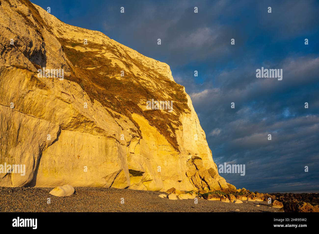 Looking up at the White cliffs of Dover at Langdon bay at Sunset on a ...