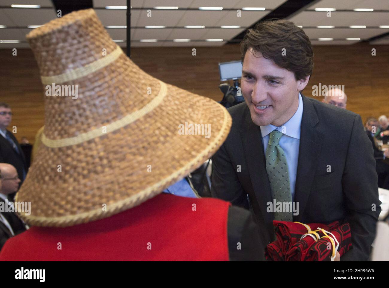 Prime Minister Justin Trudeau, right, presents Deanna George, aTsleil ...