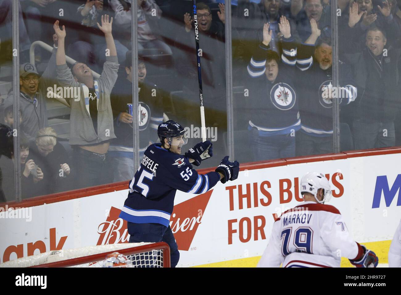 Winnipeg Jets' Mark Scheifele (55) celebrates his second goal as ...