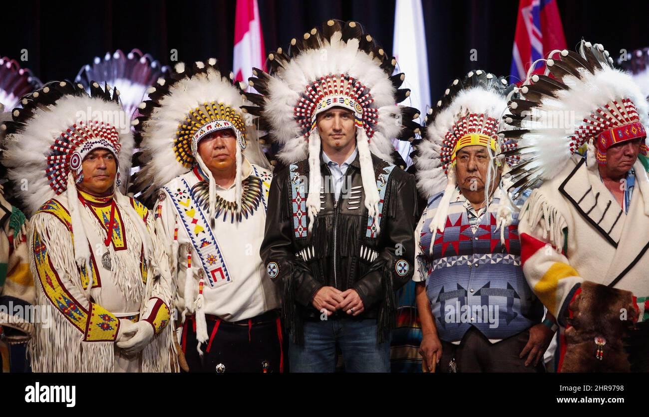 Prime Minister Justin Trudeau, centre, poses with elders after ...