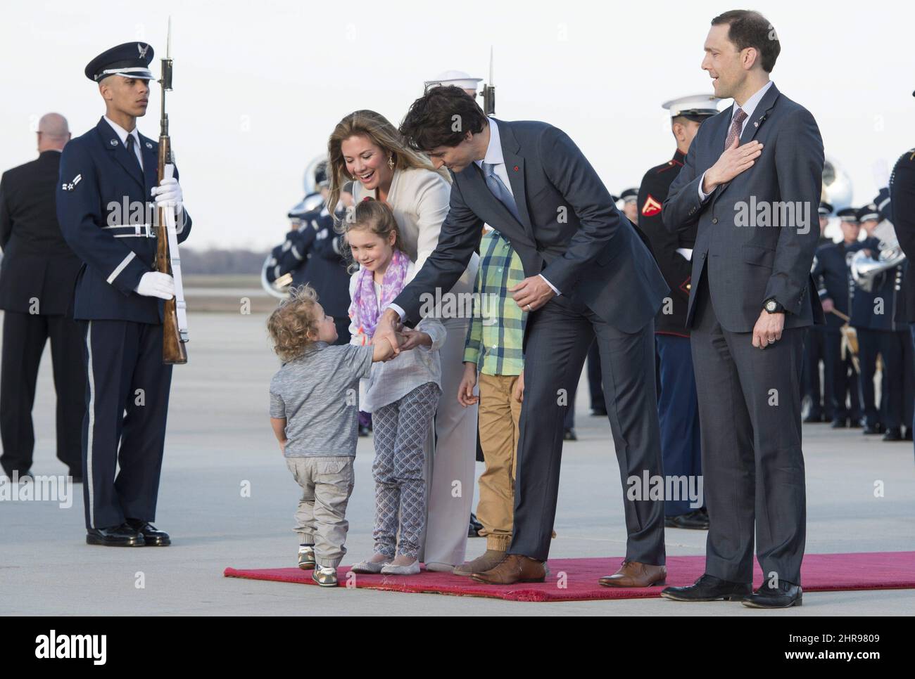Prime Minister Justin Trudeau holds back his son Hadrian during the ...
